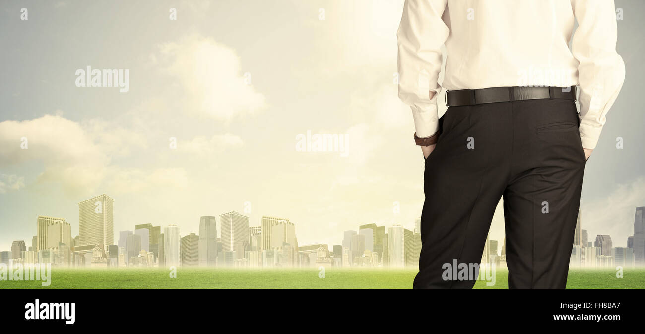 Businessman standing city view hi-res stock photography and images - Alamy