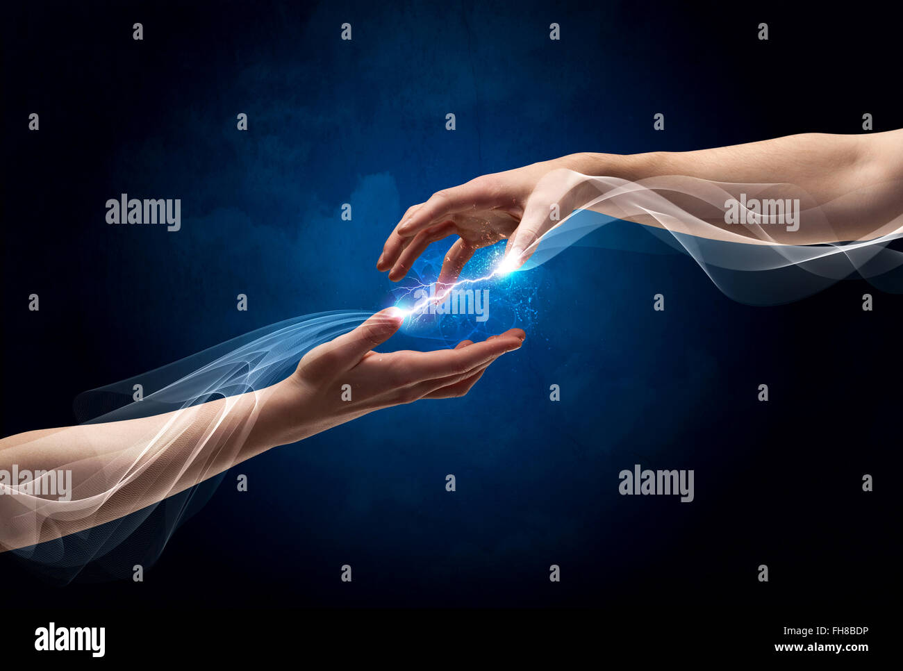 Hands connecting through fingers in space Stock Photo - Alamy