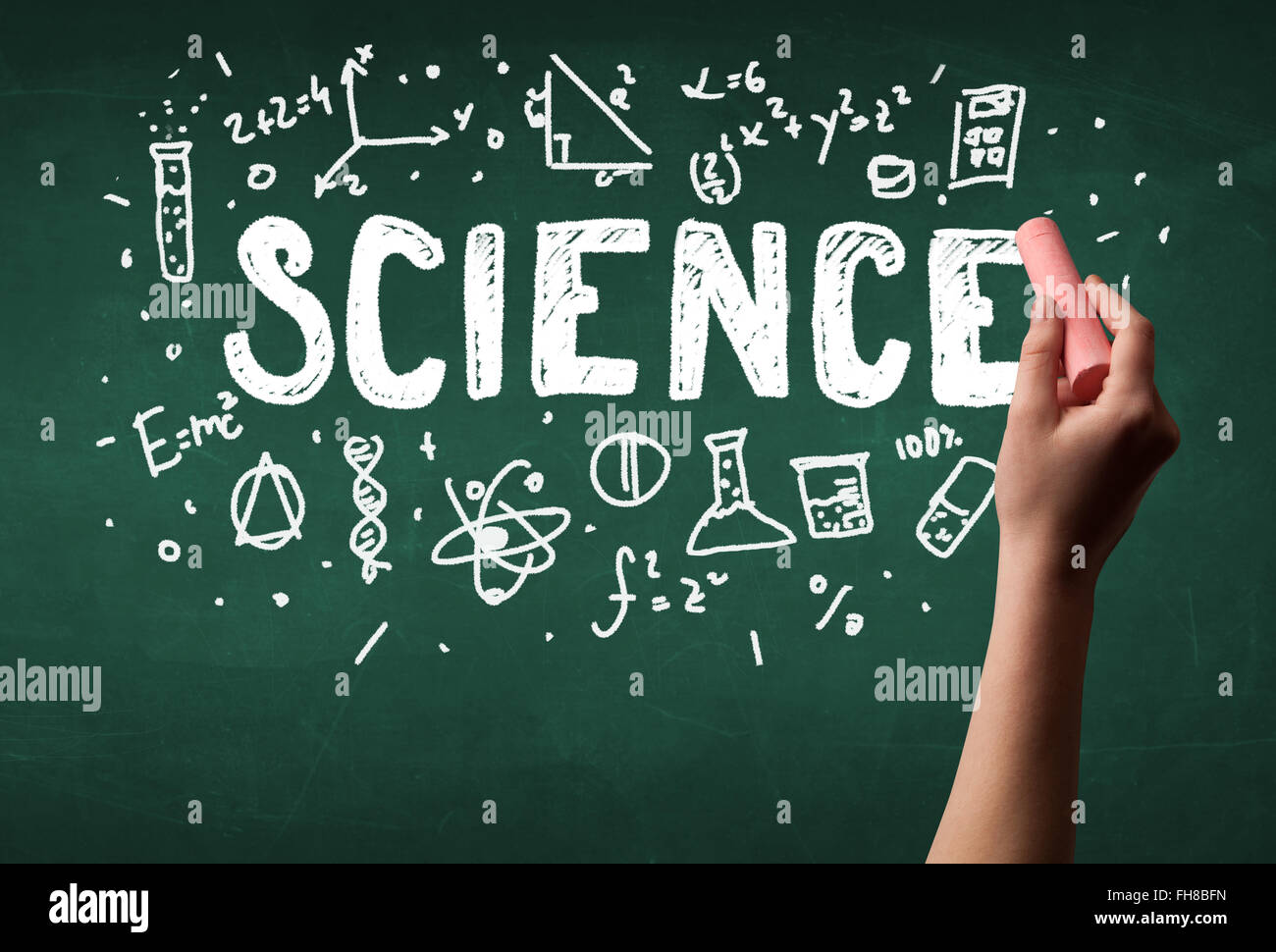 Mature science person drawing on board Stock Photo - Alamy