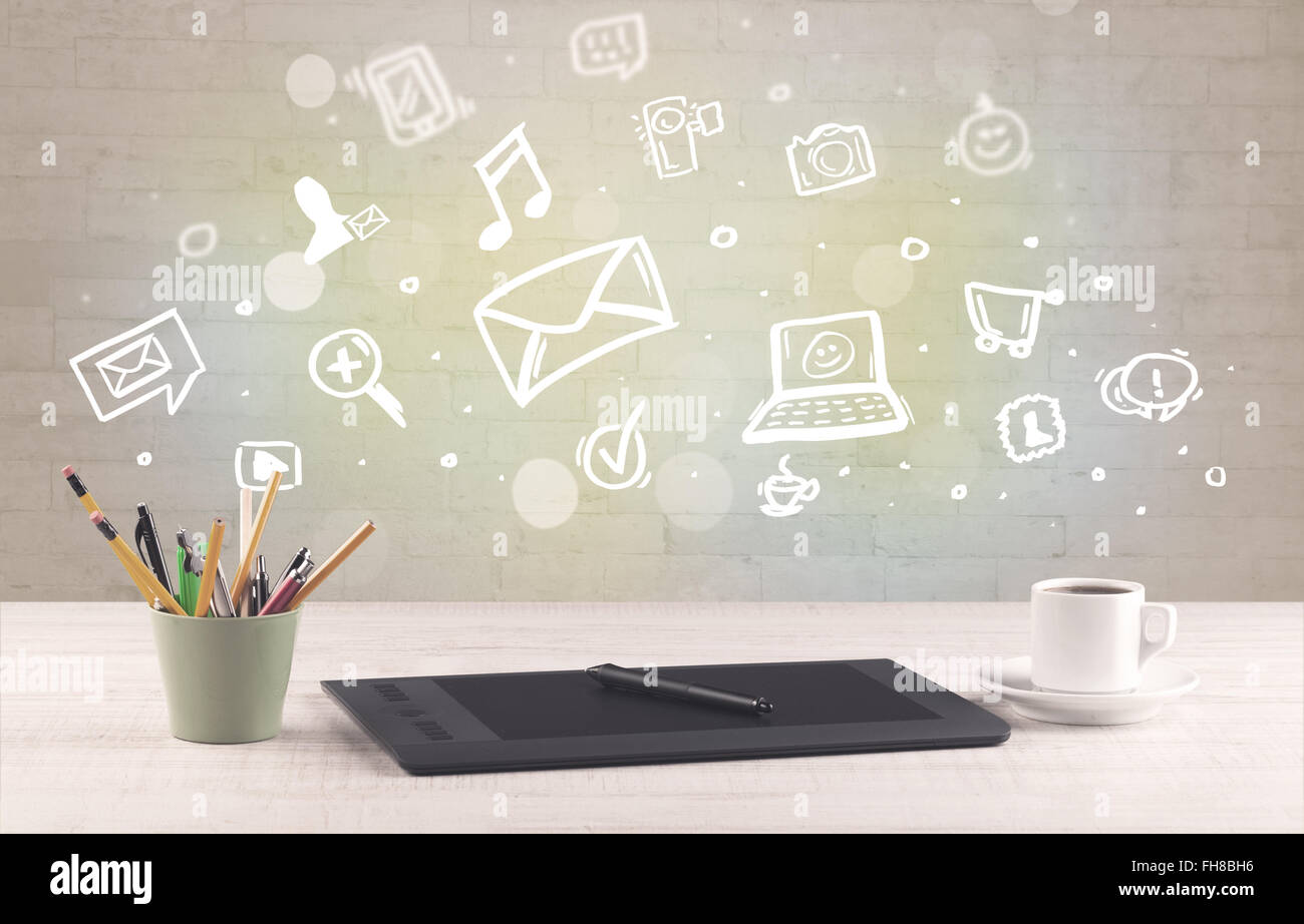 Office desk with communication icons Stock Photo - Alamy