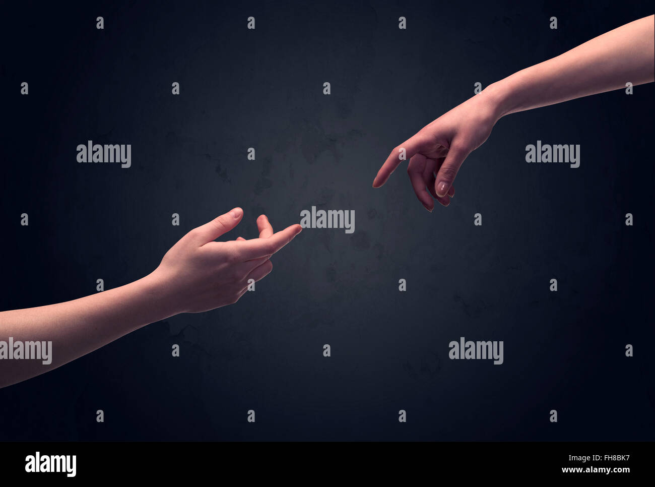 Hands reaching for one another hi-res stock photography and images - Alamy