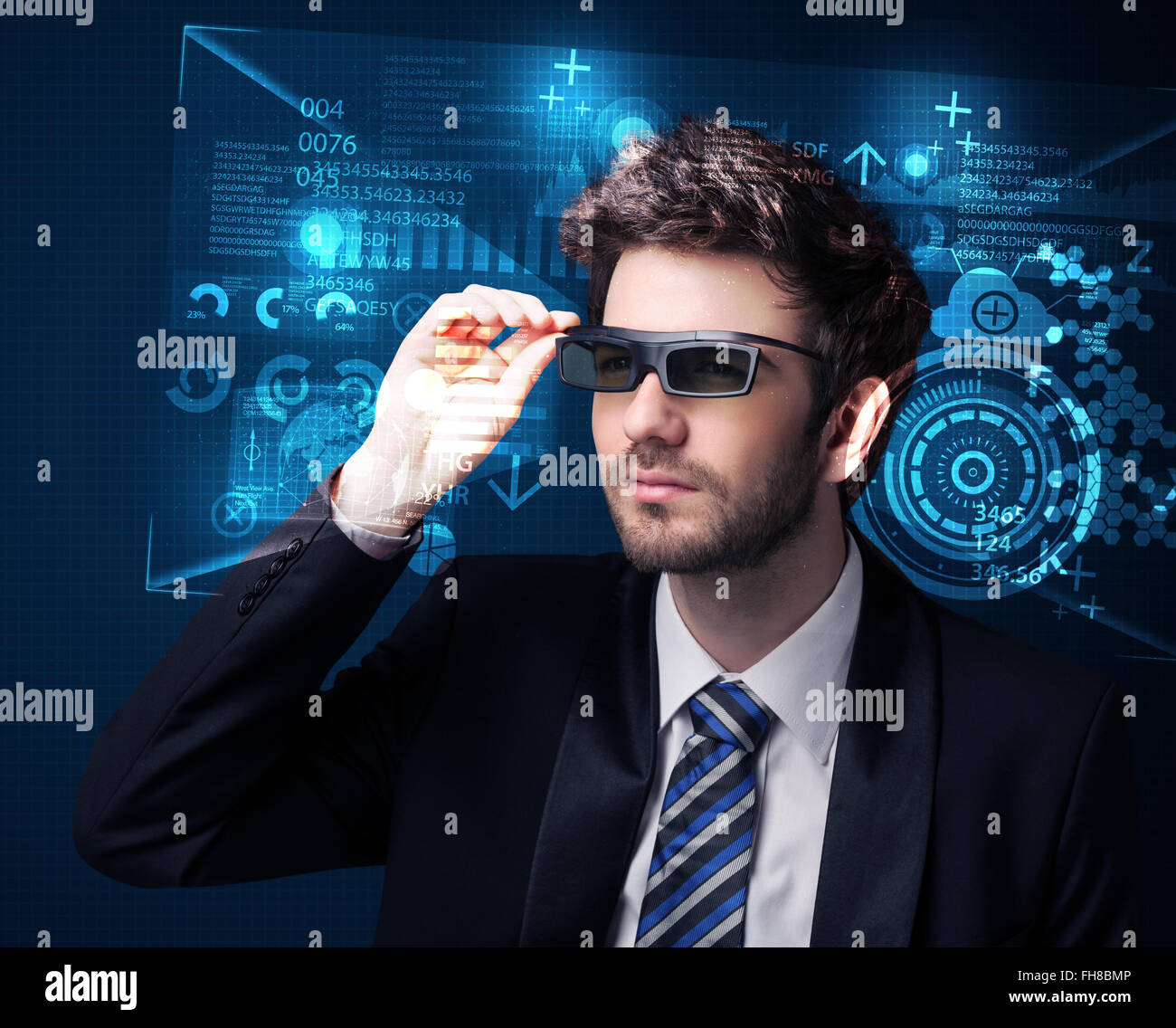 Young man looking with futuristic smart high tech glasses Stock Photo ...