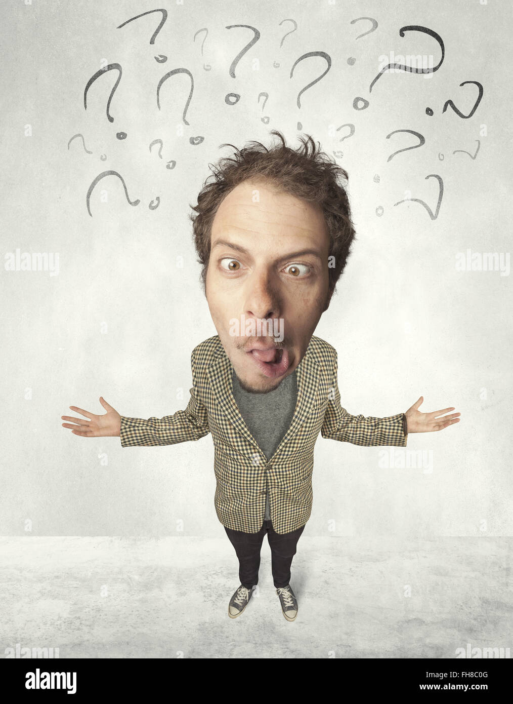 Big head person with question marks Stock Photo - Alamy
