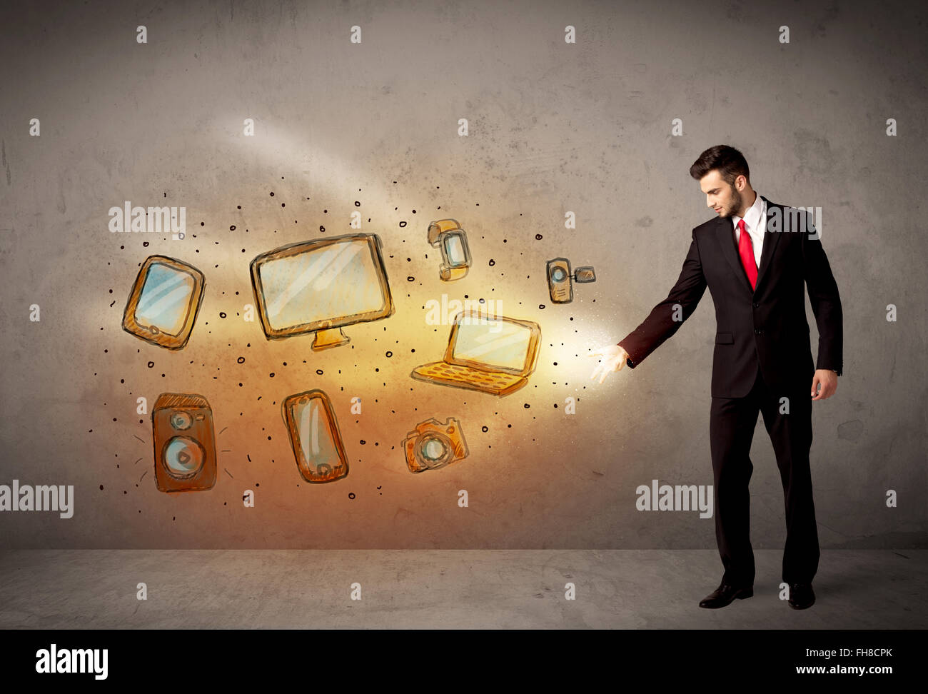 Man throwing hand drawn electronical devices Stock Photo - Alamy