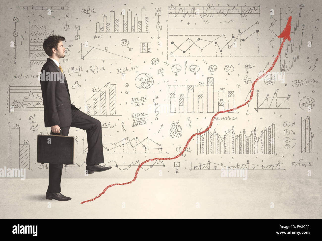 Business man climbing on red graph arrow concept Stock Photo - Alamy