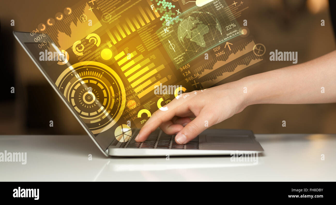 Modern notebook computer with future technology symbols Stock Photo - Alamy