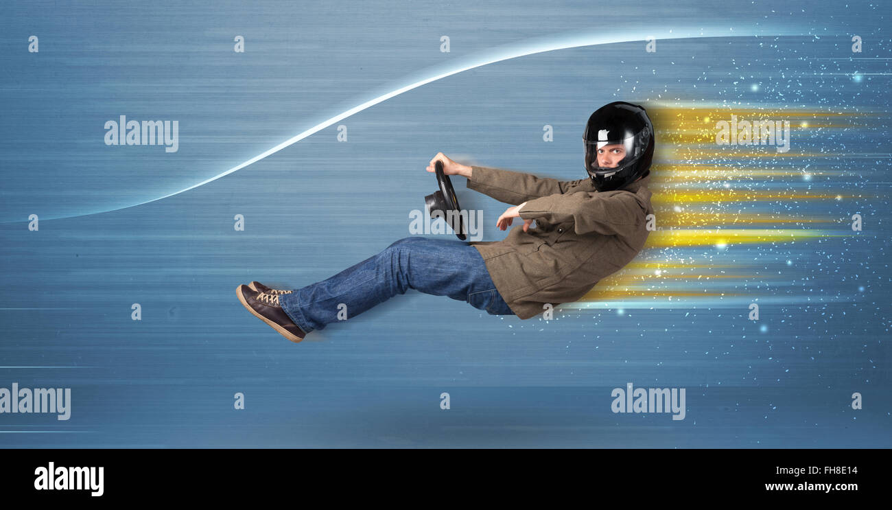 Young man driving in imaginary fast car with blurred lines Stock Photo ...