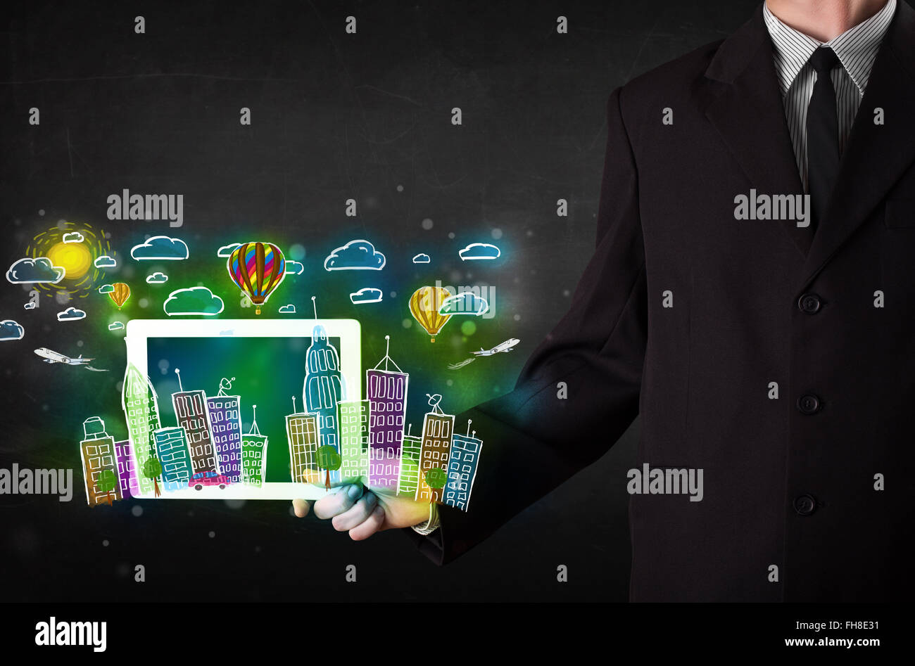 Young person showing tablet with hand drawn cityscape Stock Photo - Alamy