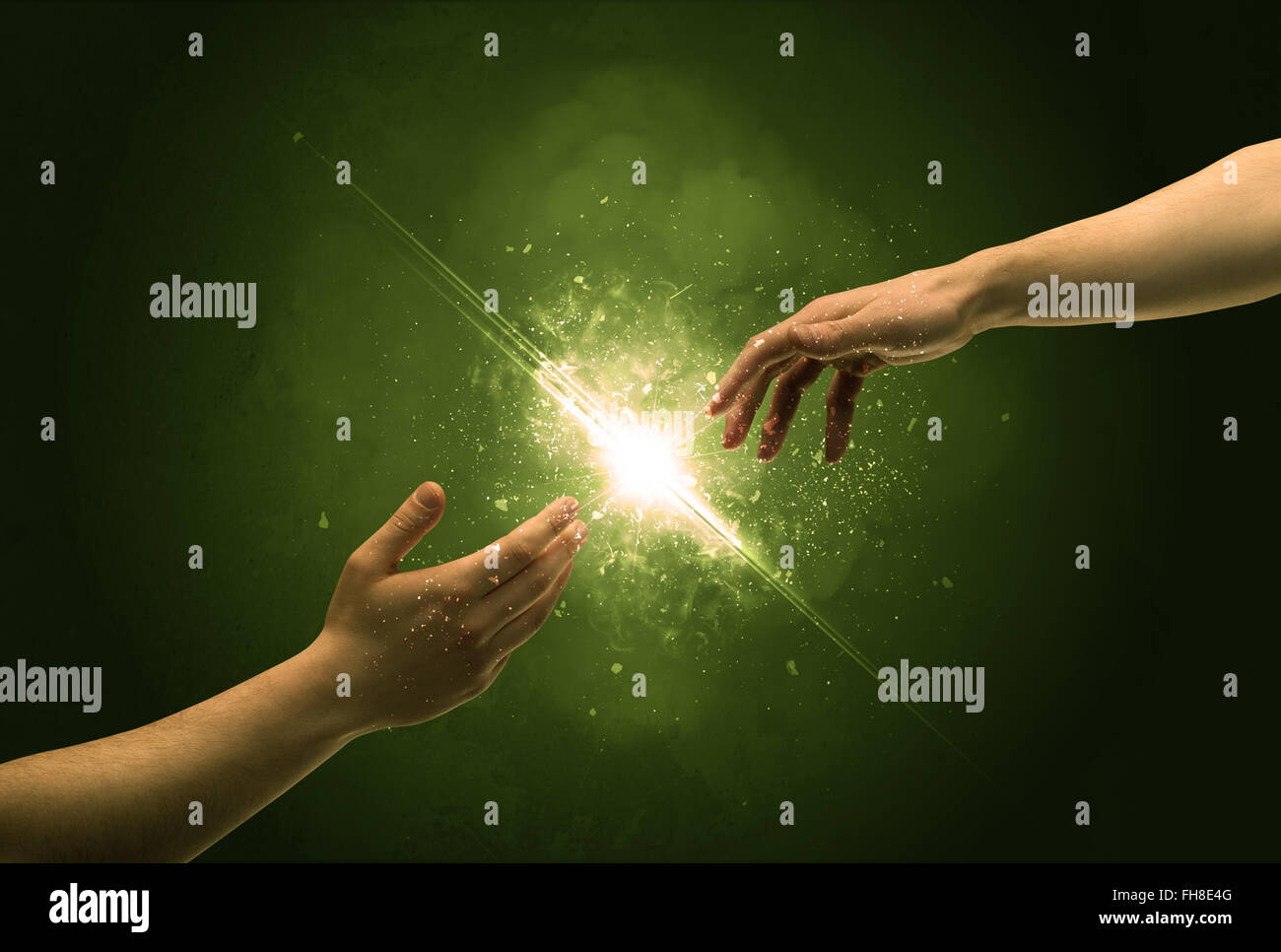 Touching arms lighting spark at fingertip Stock Photo - Alamy