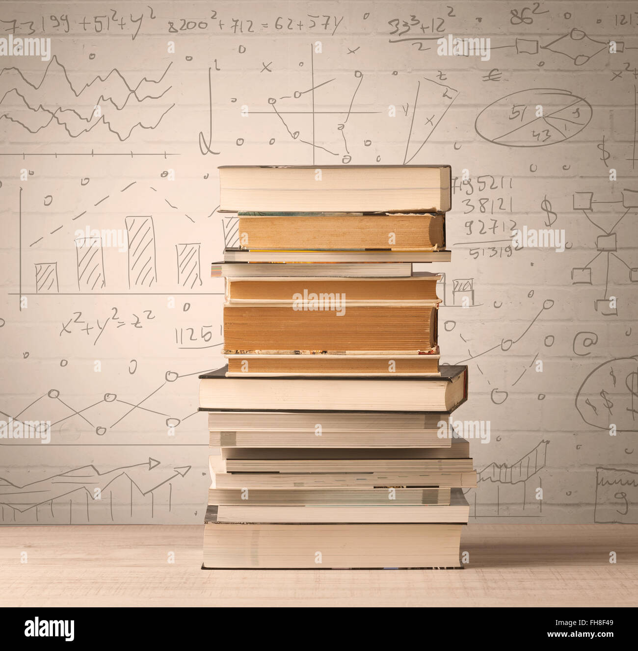 A pile of books with math formulas written in doodle style Stock Photo ...