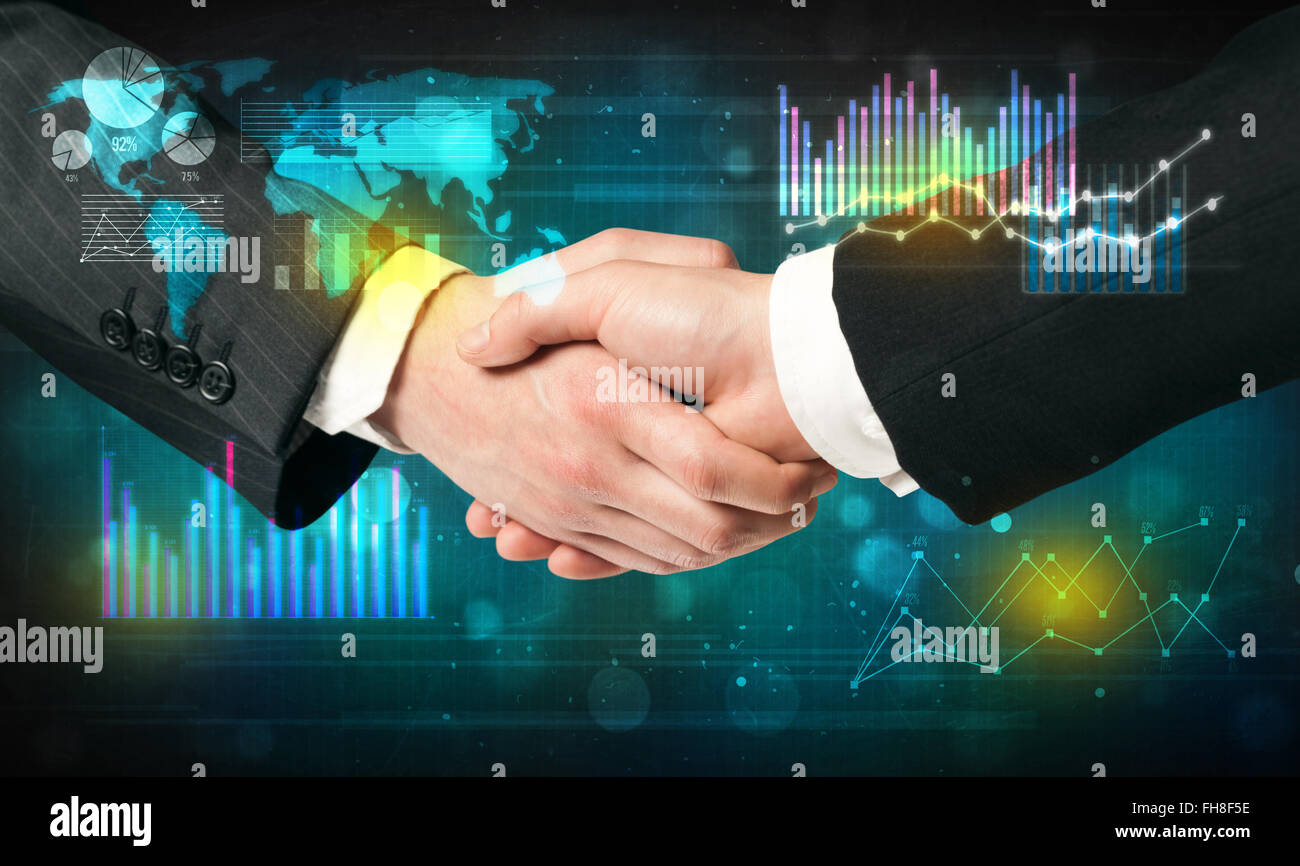 Handshake with diagrams Stock Photo - Alamy