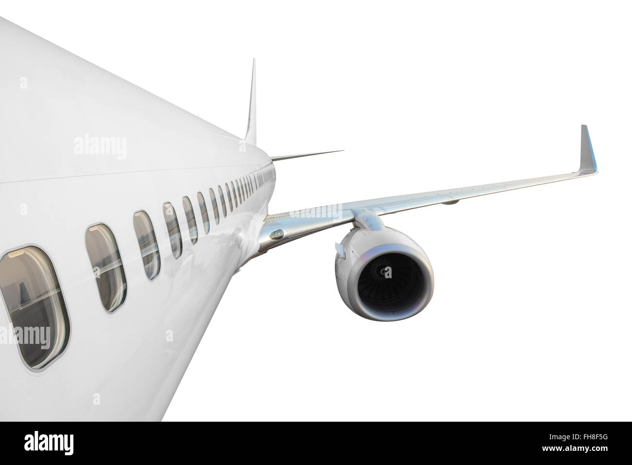 Commercial airplane side view with wing Stock Photo - Alamy