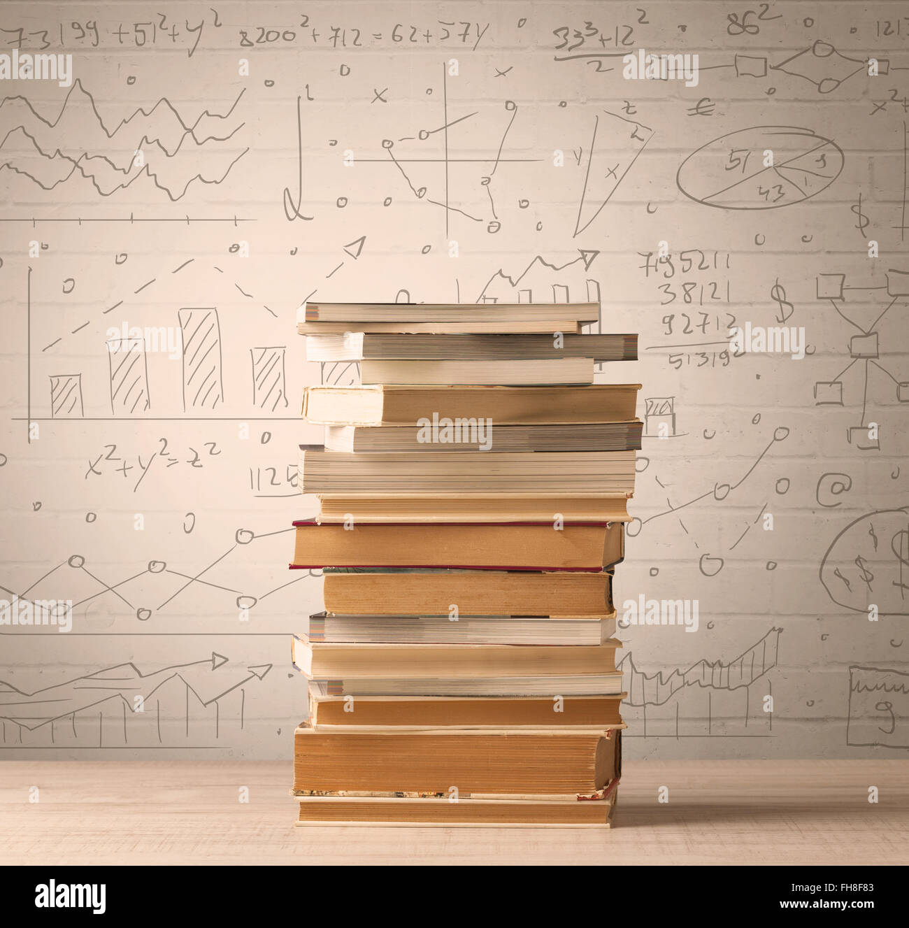 A pile of books with math formulas written in doodle style Stock Photo ...