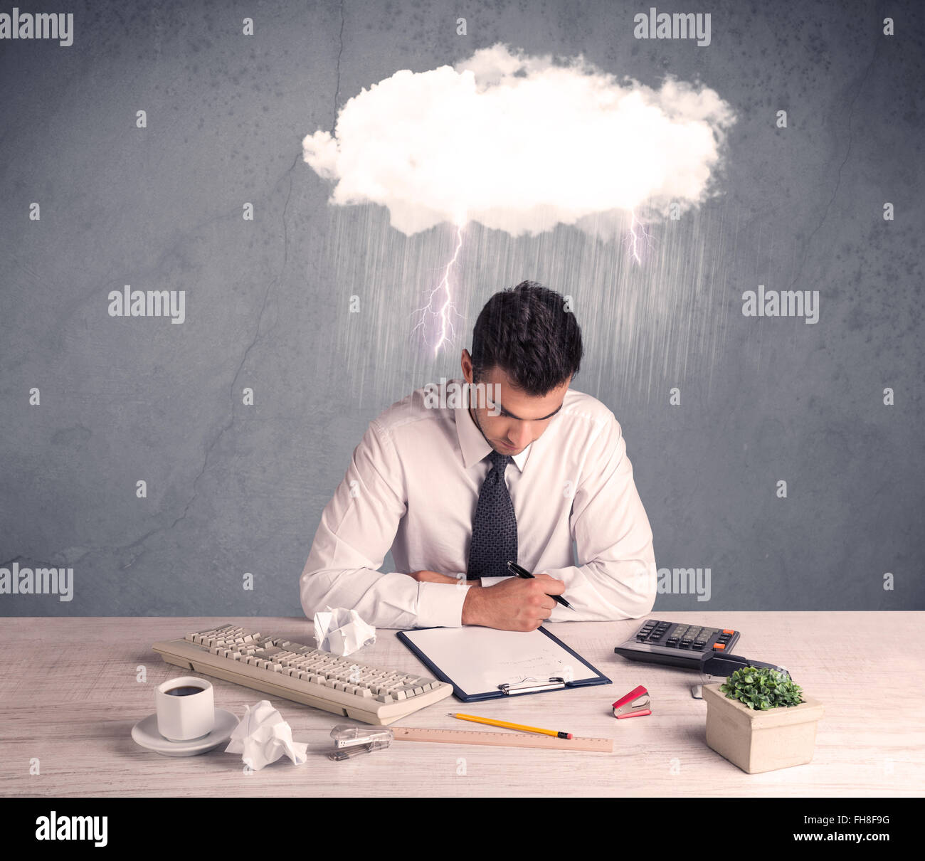 Stressed out businessman at office desk Stock Photo - Alamy