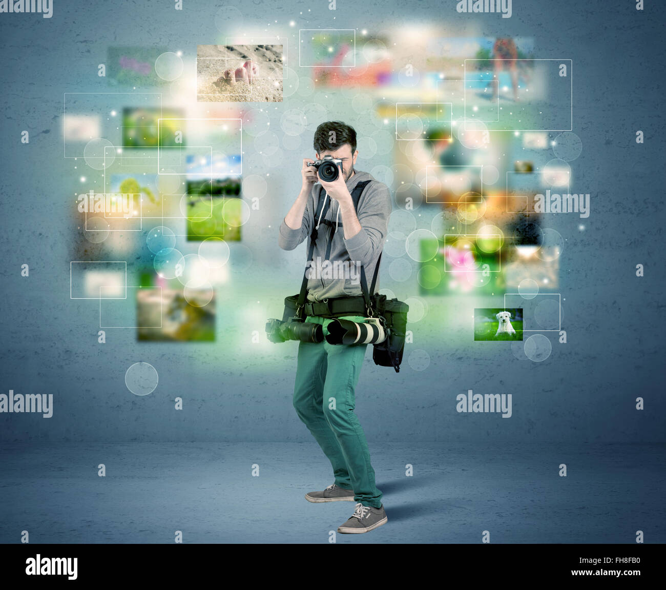 Photographer with pictures from the past Stock Photo - Alamy