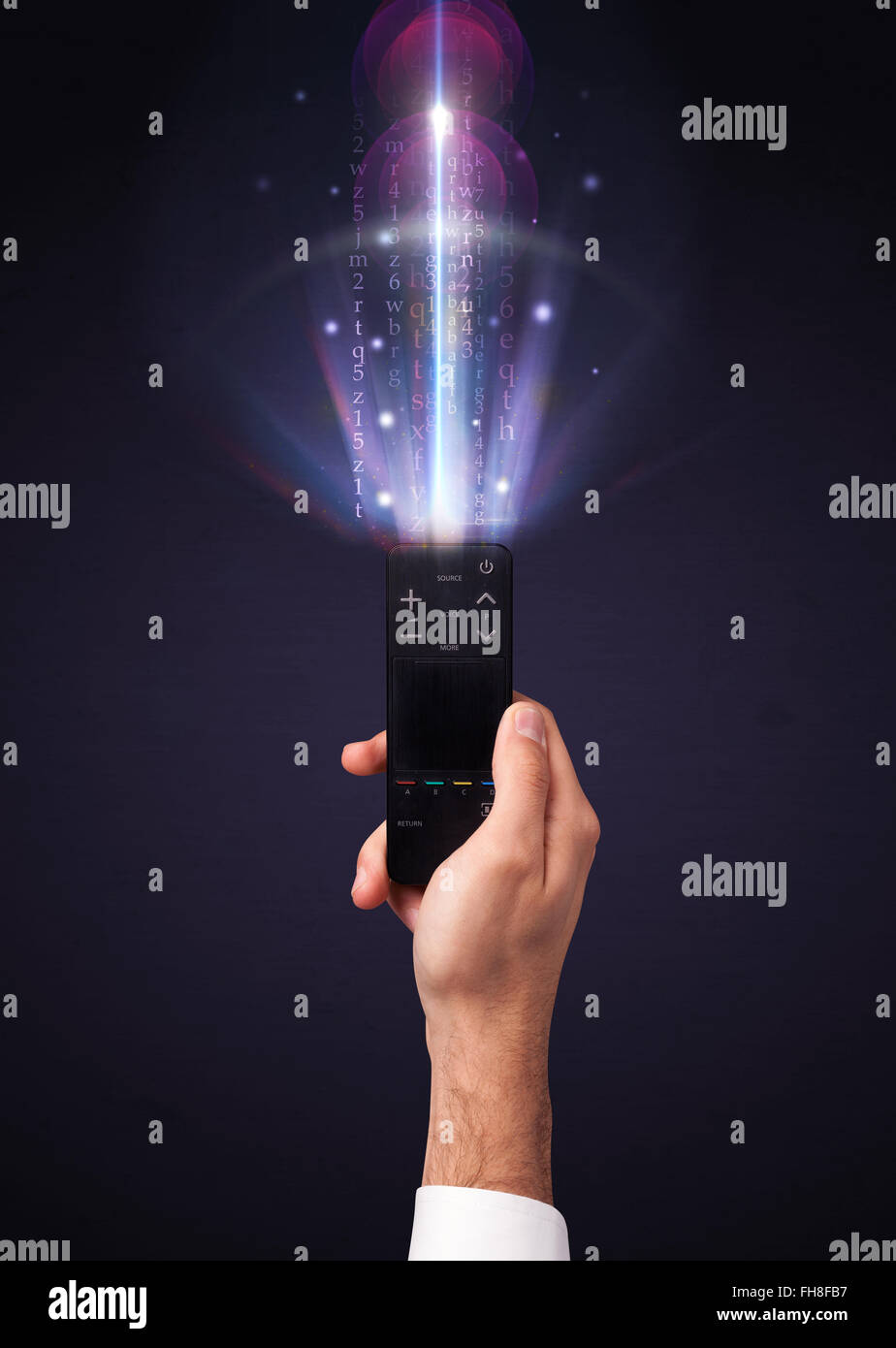 Hand with remote control and shining numbers Stock Photo - Alamy