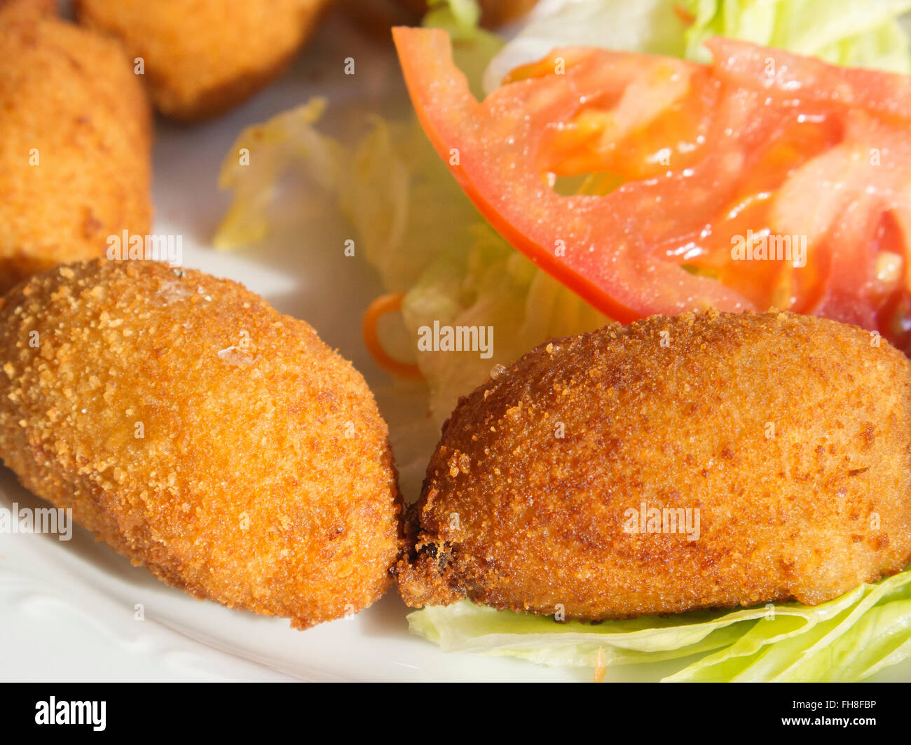 Croquettes with salad plate Stock Photo - Alamy