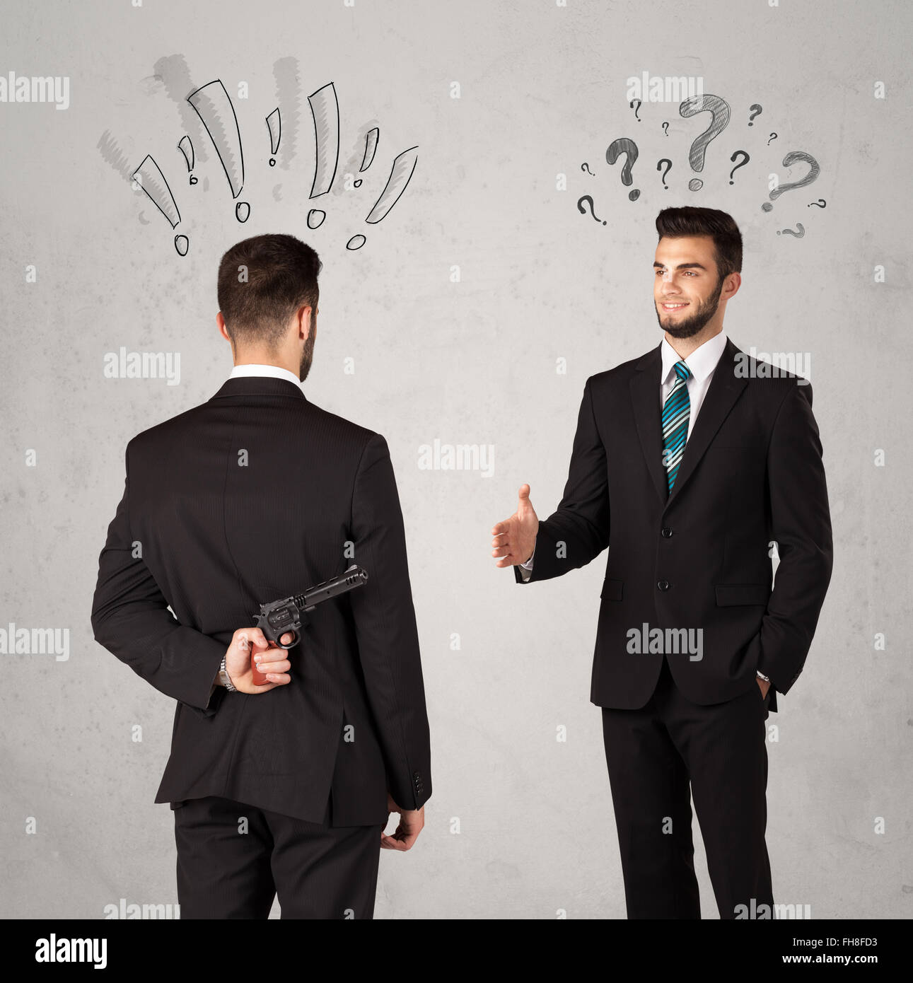 Ruthless business handshake Stock Photo - Alamy