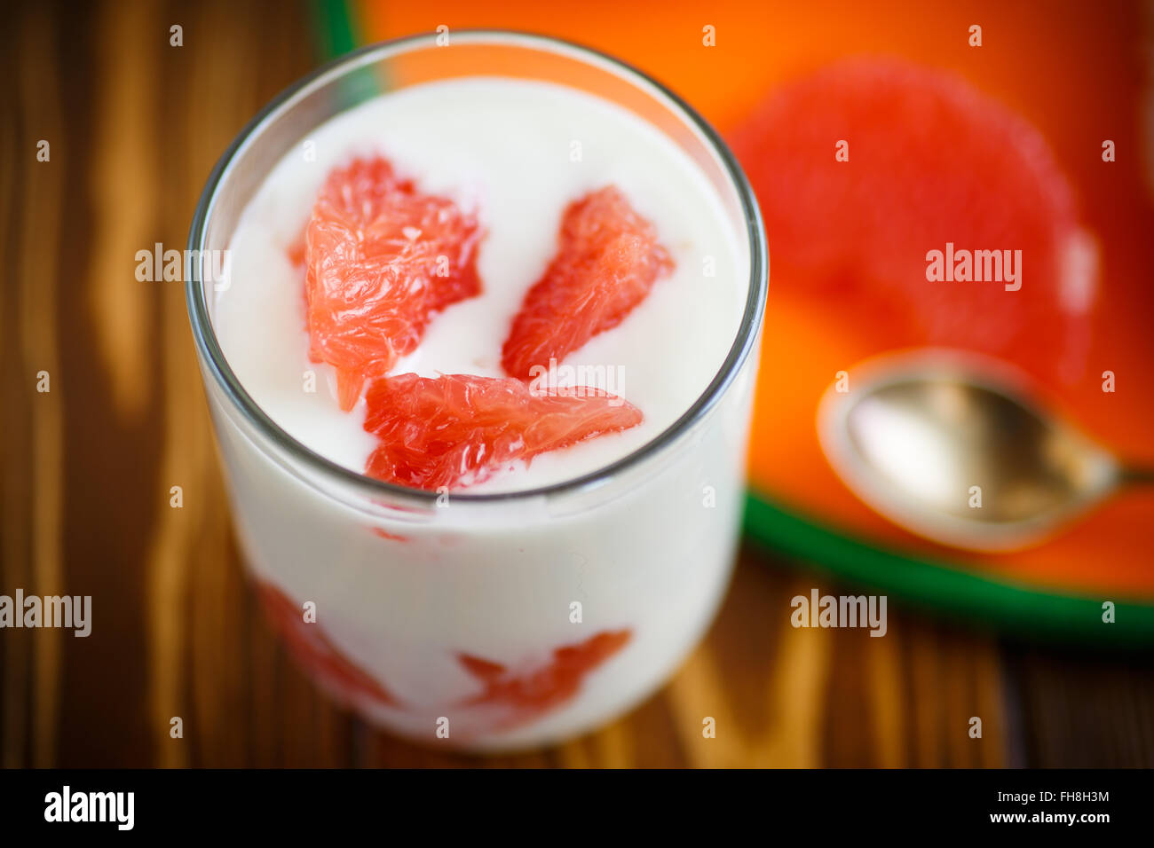 Greek yogurt with red grapefruit Stock Photo - Alamy
