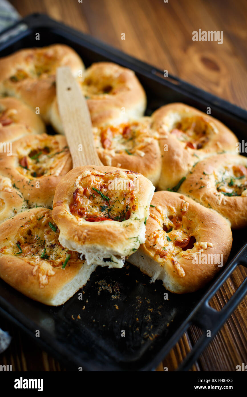 mini pizzas baked stuffed with cheese Stock Photo - Alamy