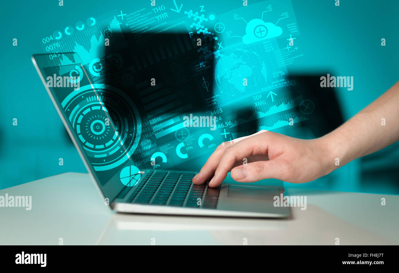 Modern notebook computer with future technology symbols Stock Photo - Alamy