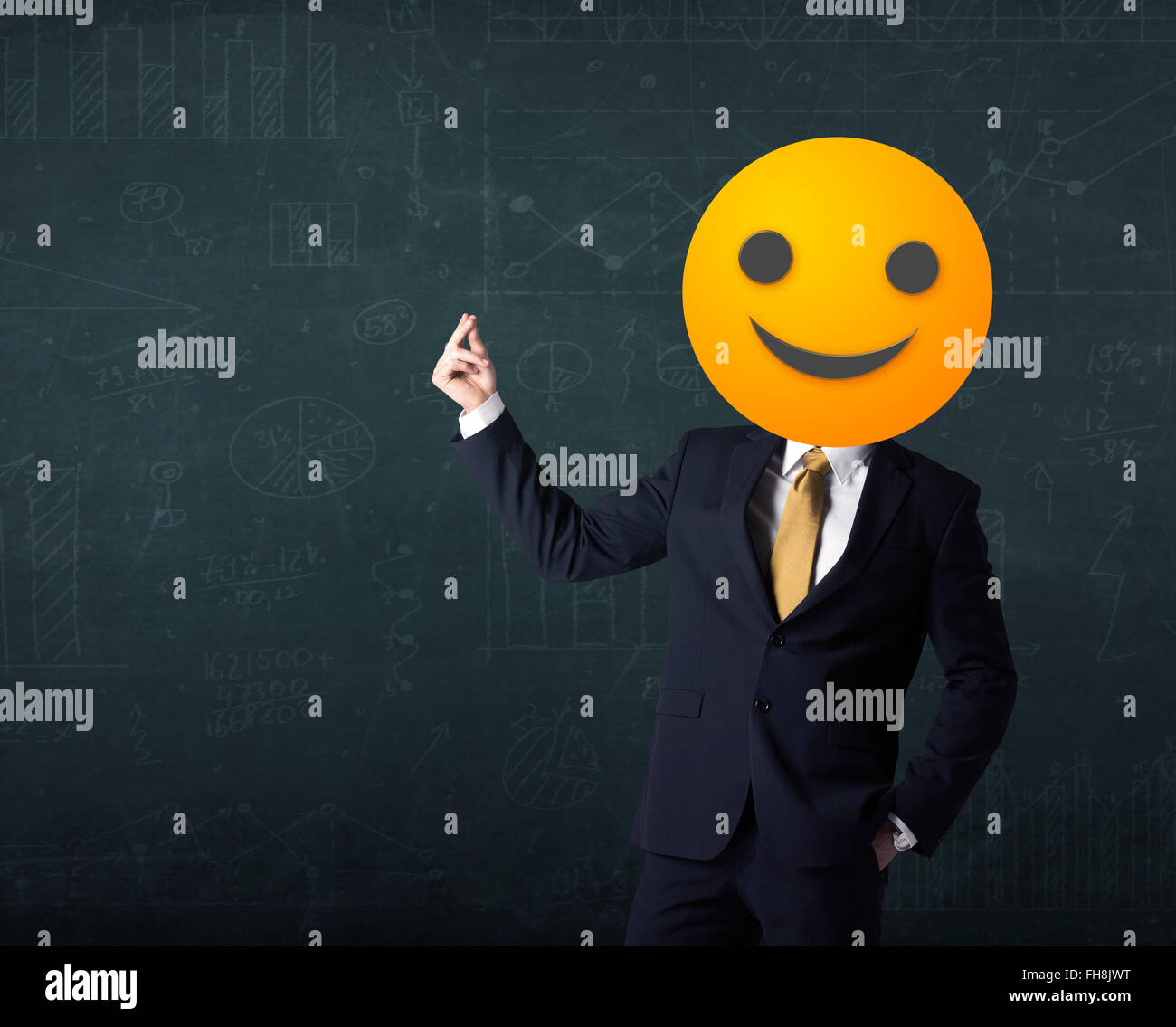 businessman wears yellow smiley face Stock Photo - Alamy