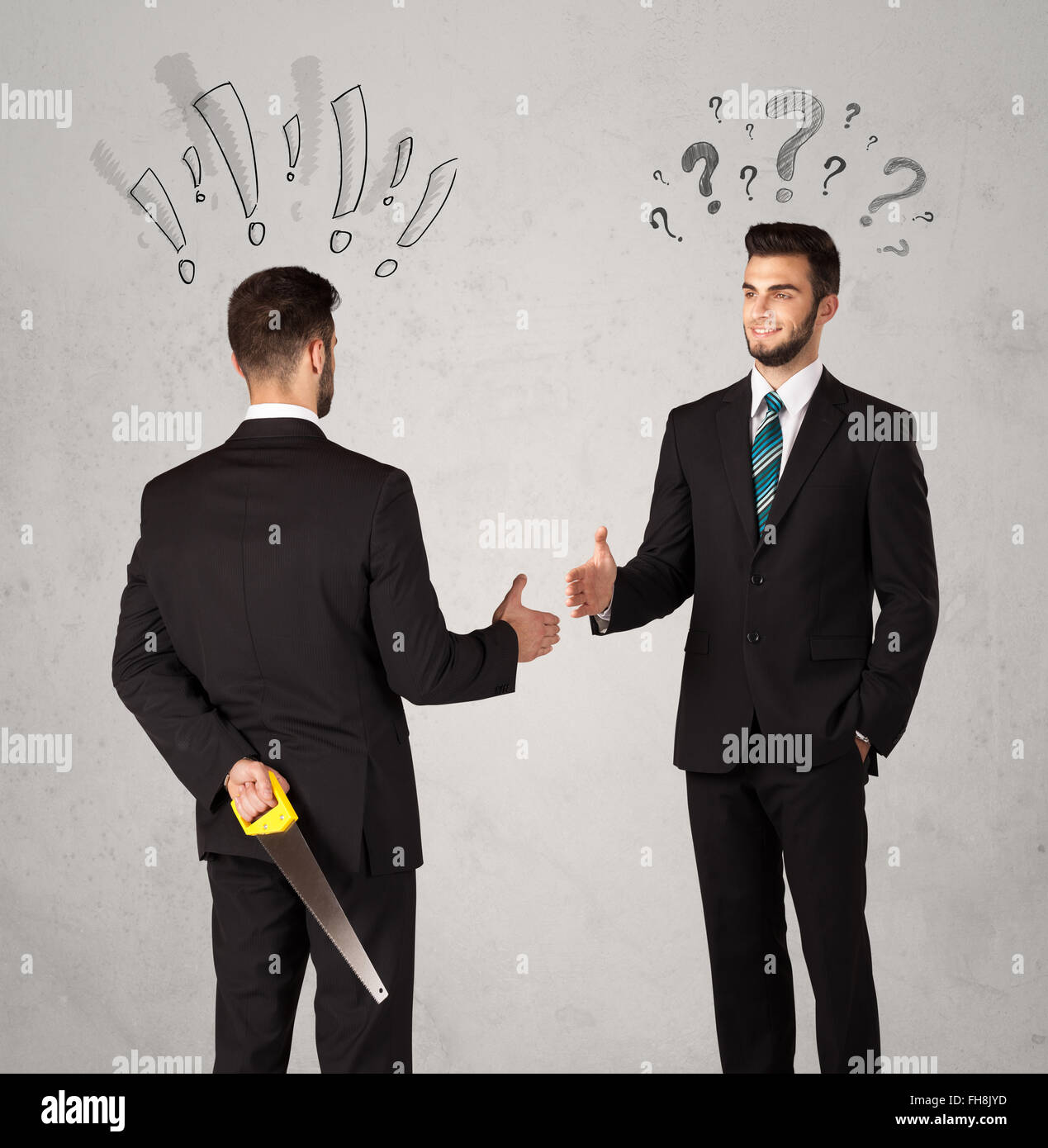 Ruthless business handshake Stock Photo - Alamy