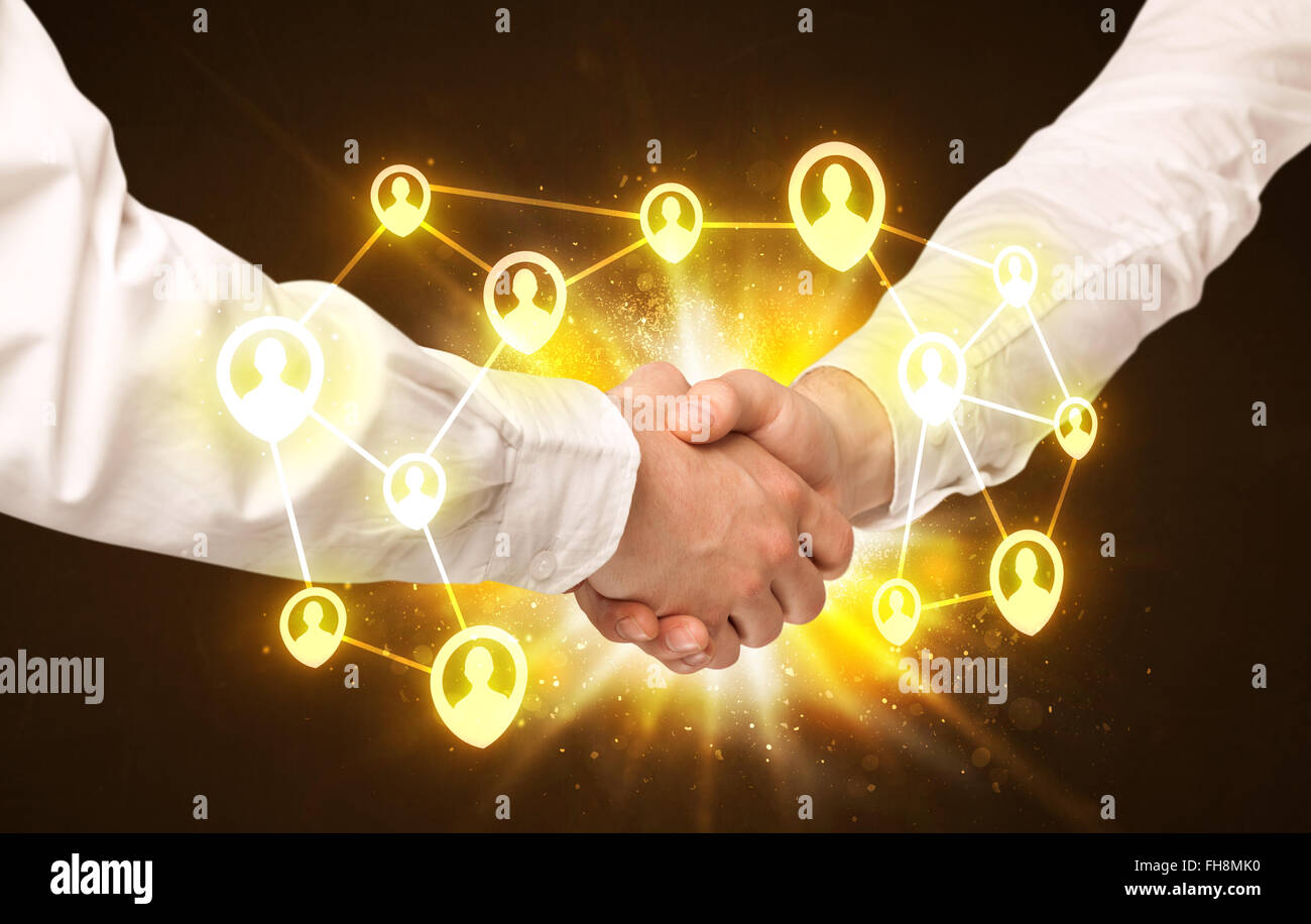 Social netwok connection handshake Stock Photo - Alamy