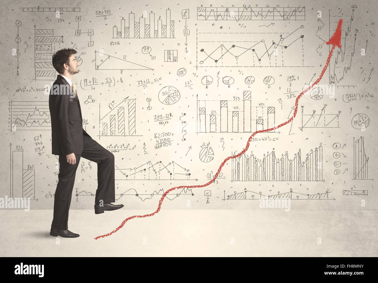 Business man climbing on red graph arrow concept Stock Photo - Alamy