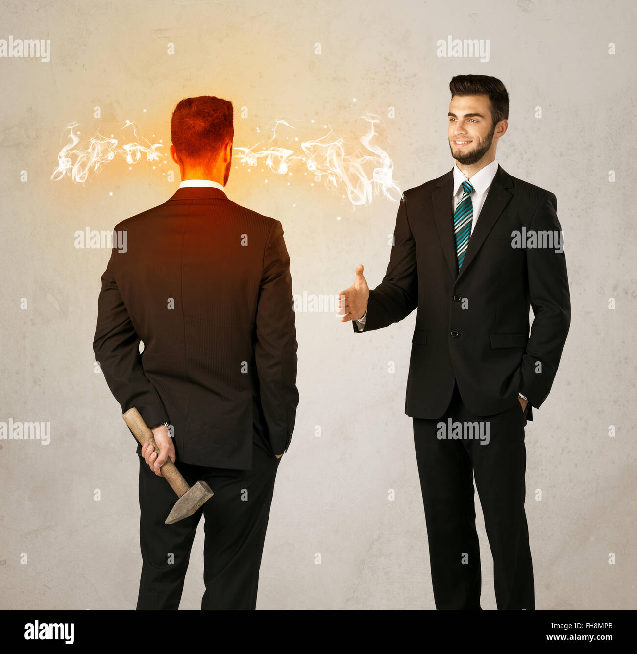 Angry businessman with weapon Stock Photo - Alamy