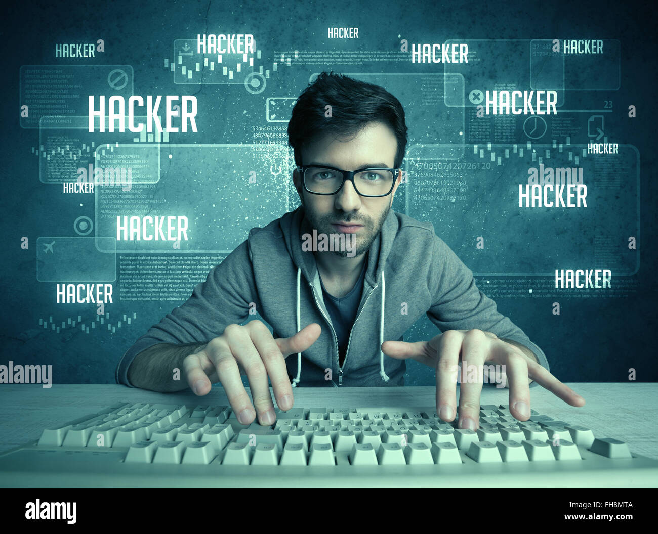 Hacker with keyboard and glasses Stock Photo - Alamy