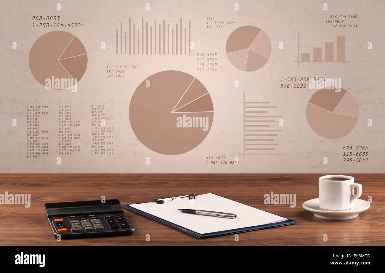 Pie chart graph office desk Stock Photo - Alamy