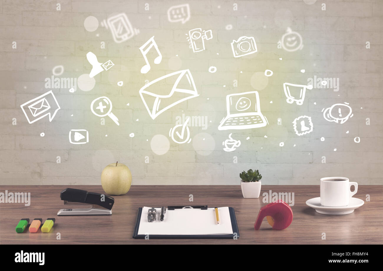 Office desk with communication icons Stock Photo - Alamy
