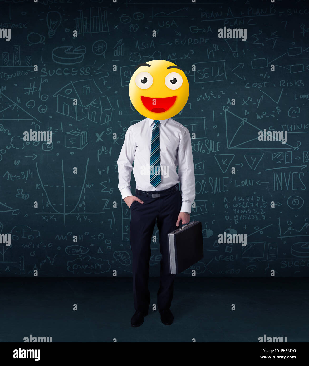 businessman wears yellow smiley face Stock Photo - Alamy