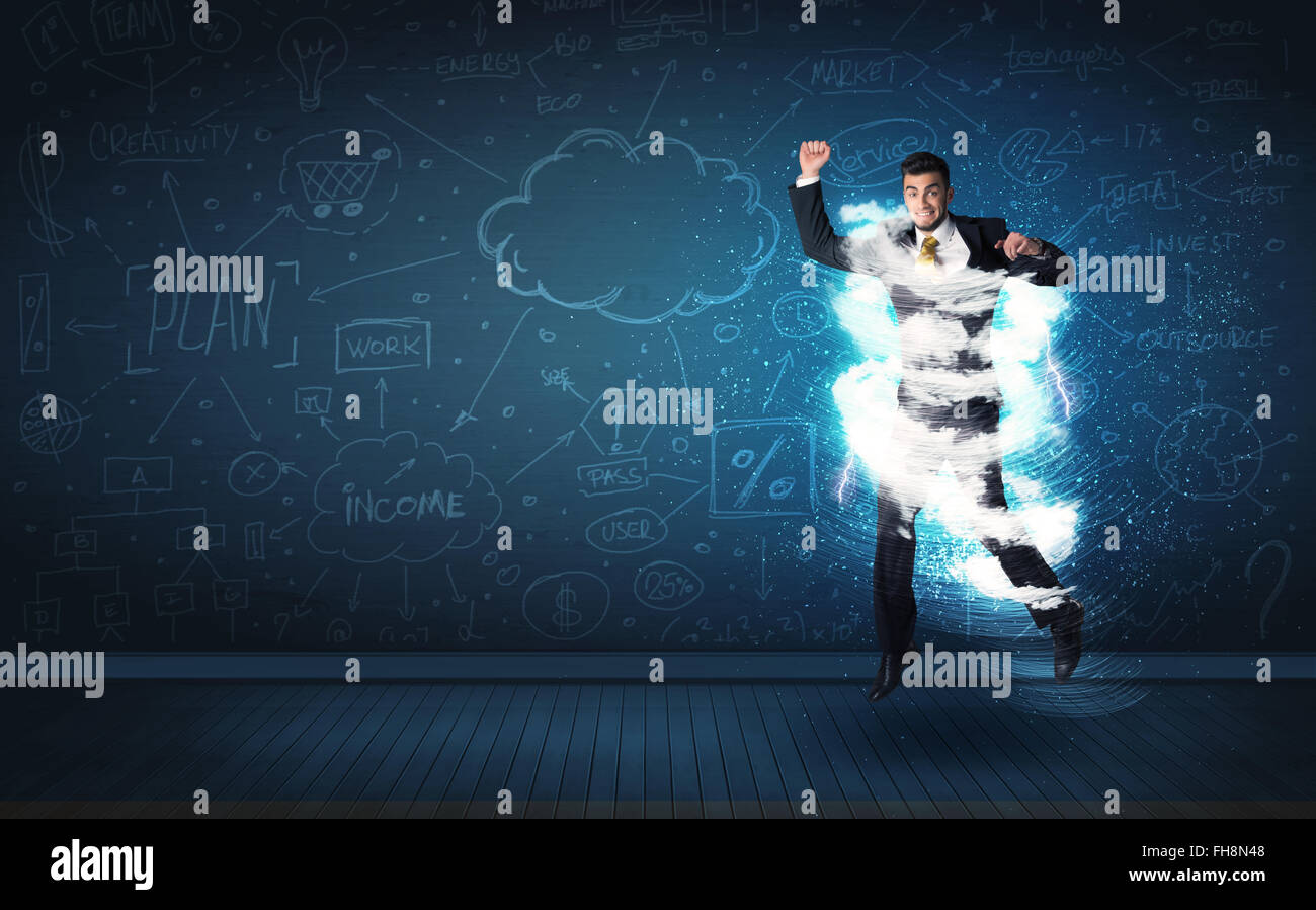 Happy business man jumping with storm cloud around him Stock Photo - Alamy