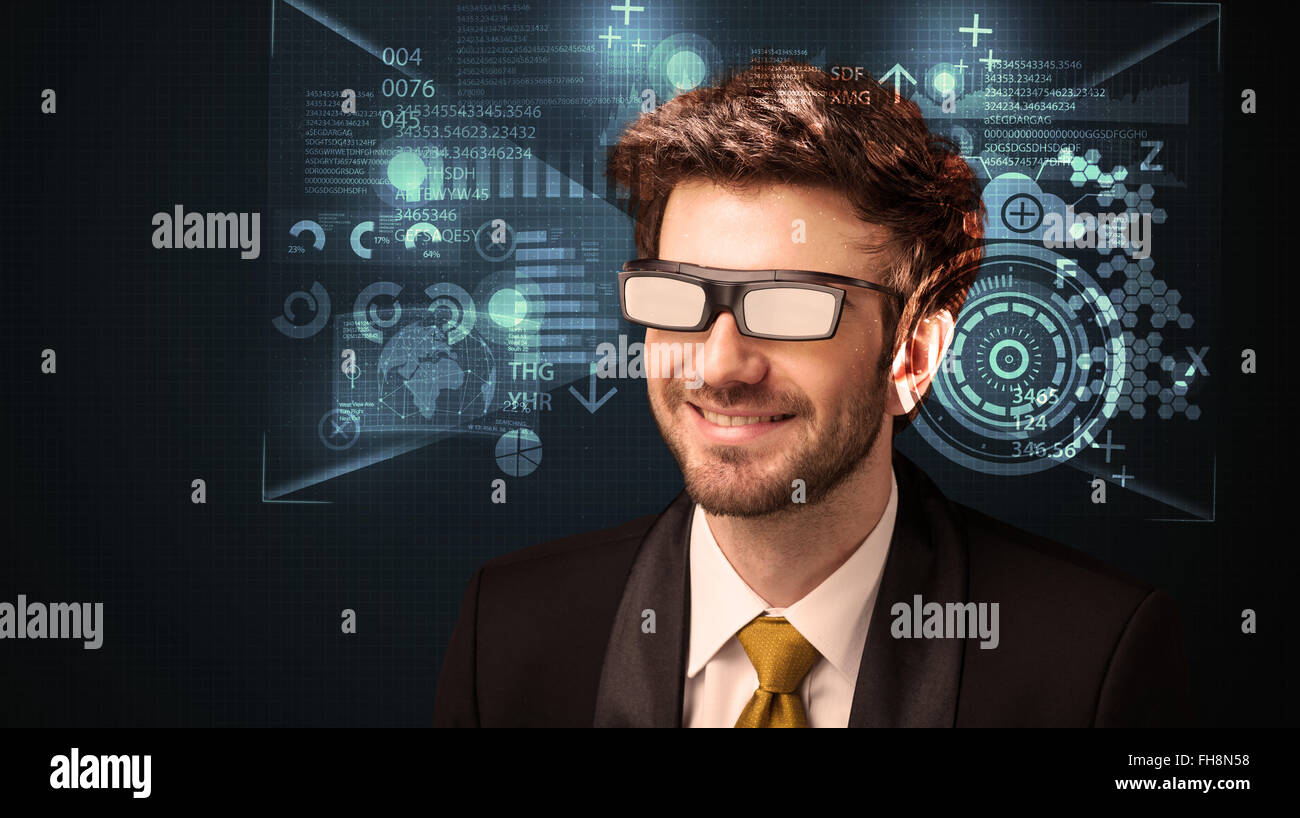 Young man looking with futuristic smart high tech glasses Stock Photo ...