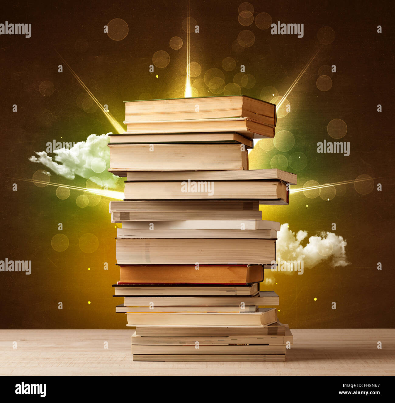 Magical books with ray of magical lights and colorful clouds Stock ...