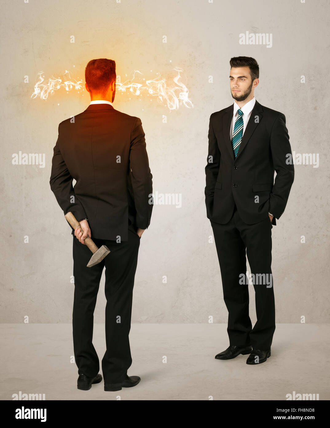 Angry businessman with weapon Stock Photo - Alamy