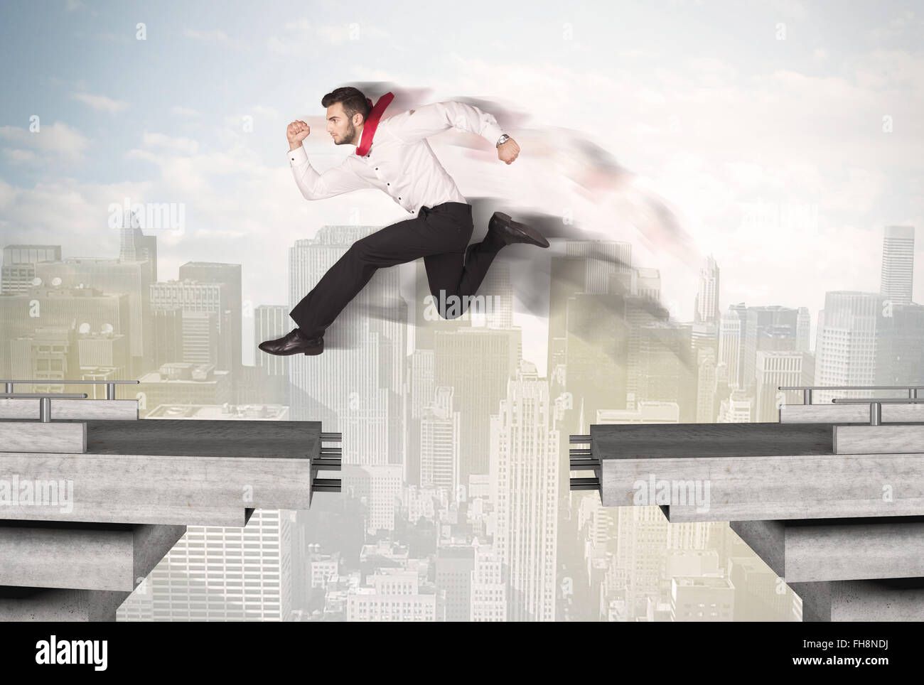 Energetic business man jumping over a bridge with gap Stock Photo - Alamy