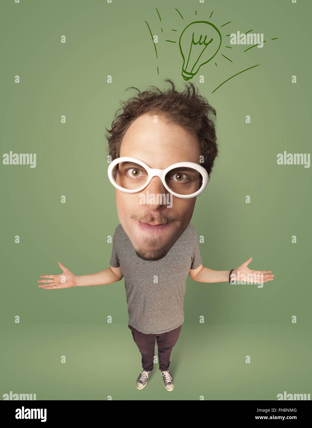 Big head person with idea bulb Stock Photo - Alamy