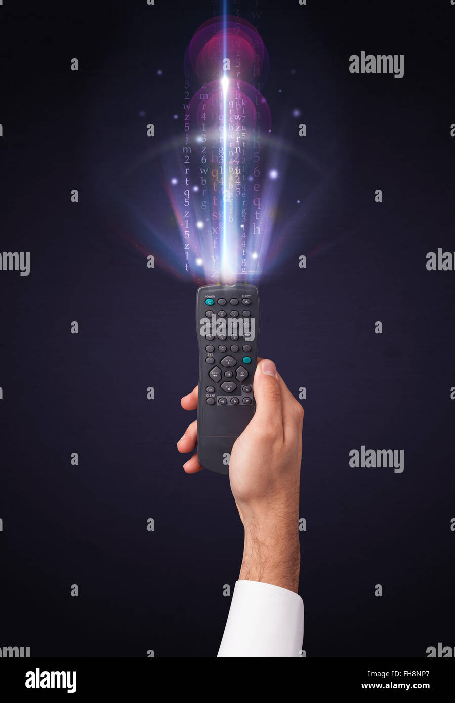 Hand with remote control and shining numbers Stock Photo - Alamy