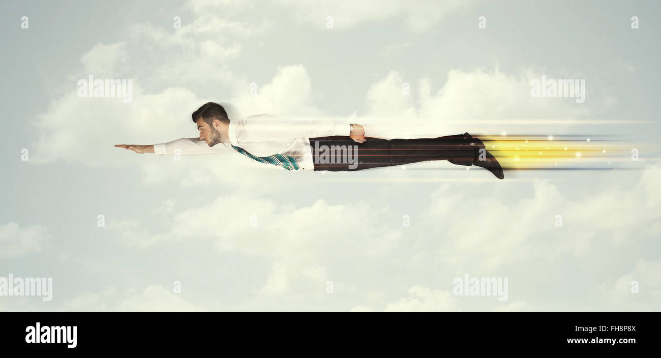 Happy business man flying fast on the sky between clouds Stock Photo ...