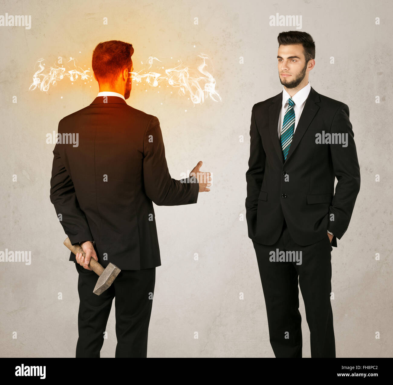 Angry businessman with weapon Stock Photo - Alamy