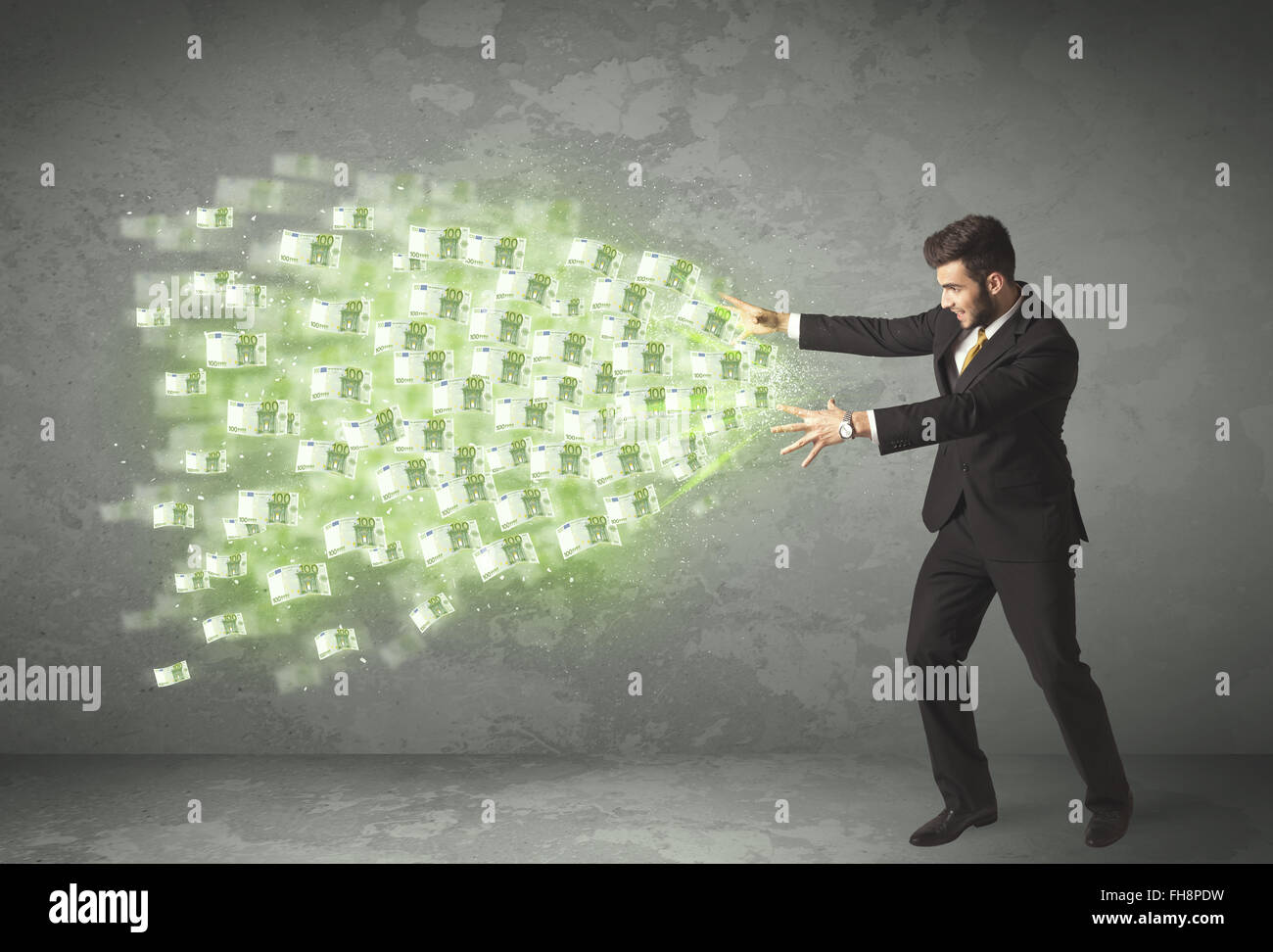 Young business person throwing money concept Stock Photo - Alamy