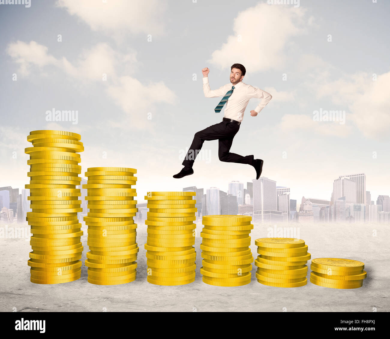 Successful business man jumping up on gold coin money Stock Photo - Alamy