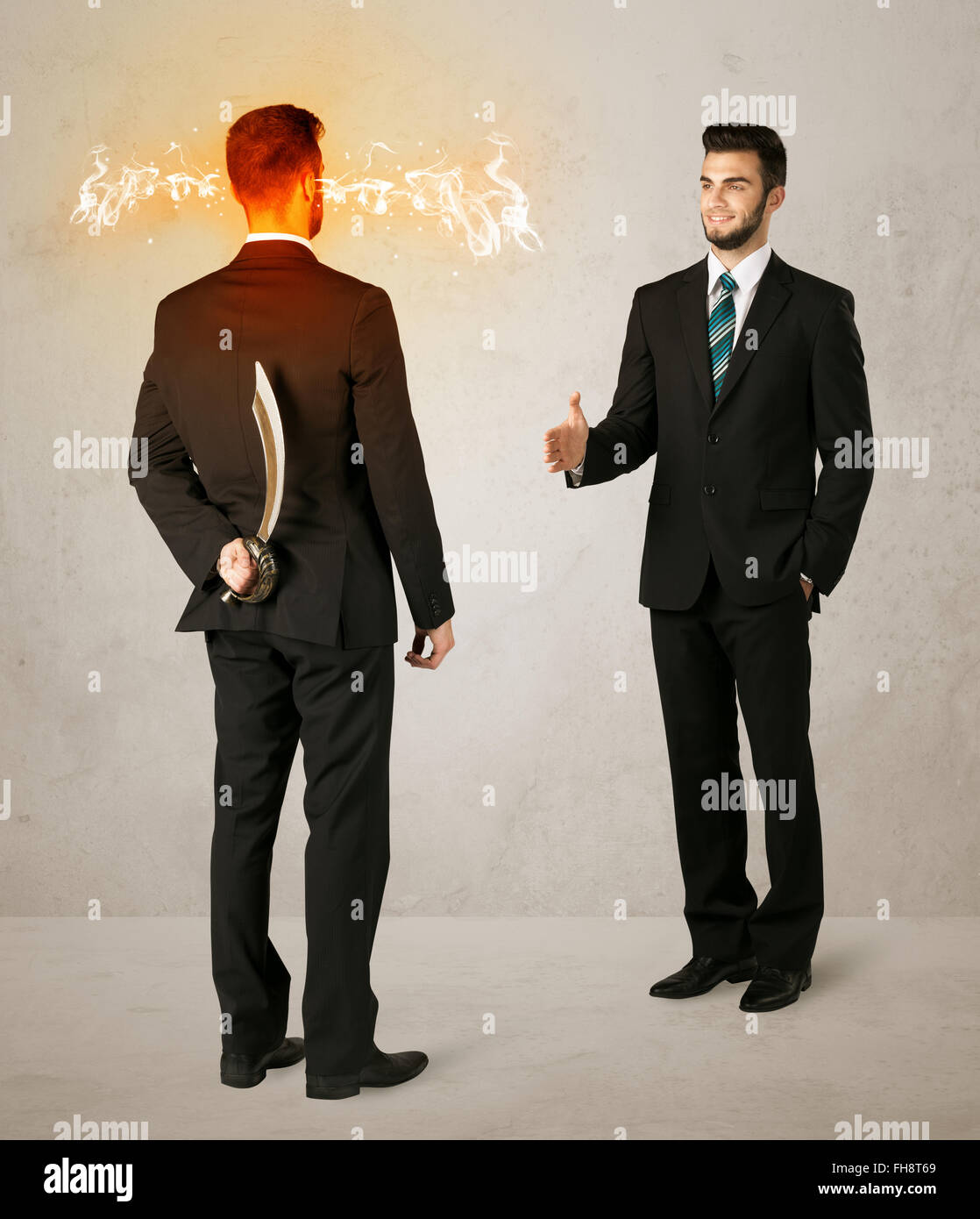 Angry businessman with weapon Stock Photo - Alamy