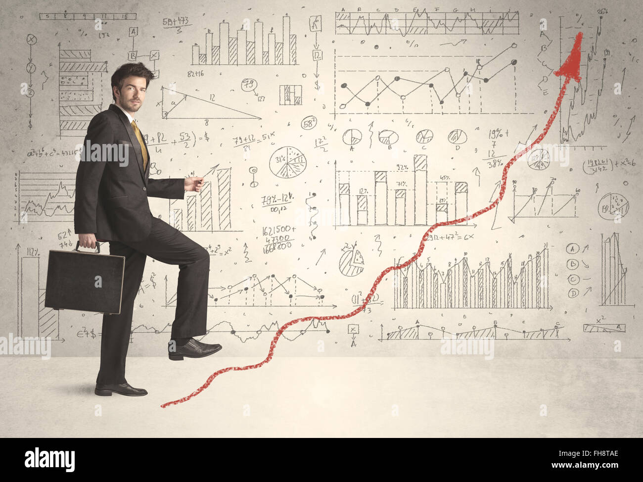 Business man climbing on red graph arrow concept Stock Photo - Alamy