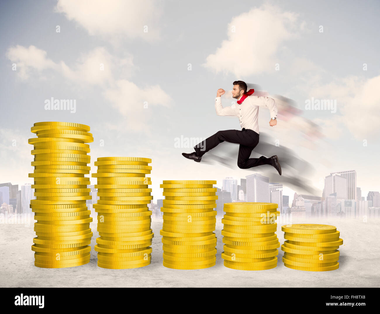 Successful business man jumping up on gold coin money Stock Photo - Alamy