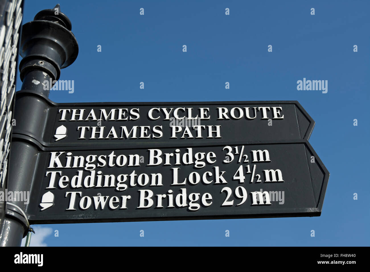 direction sign at hampton court, london, england, showing routes and ...