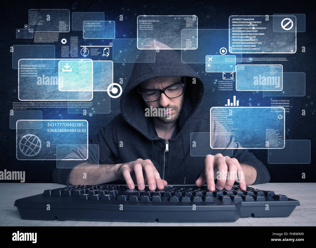 Nerd with glasses hacking websites Stock Photo - Alamy